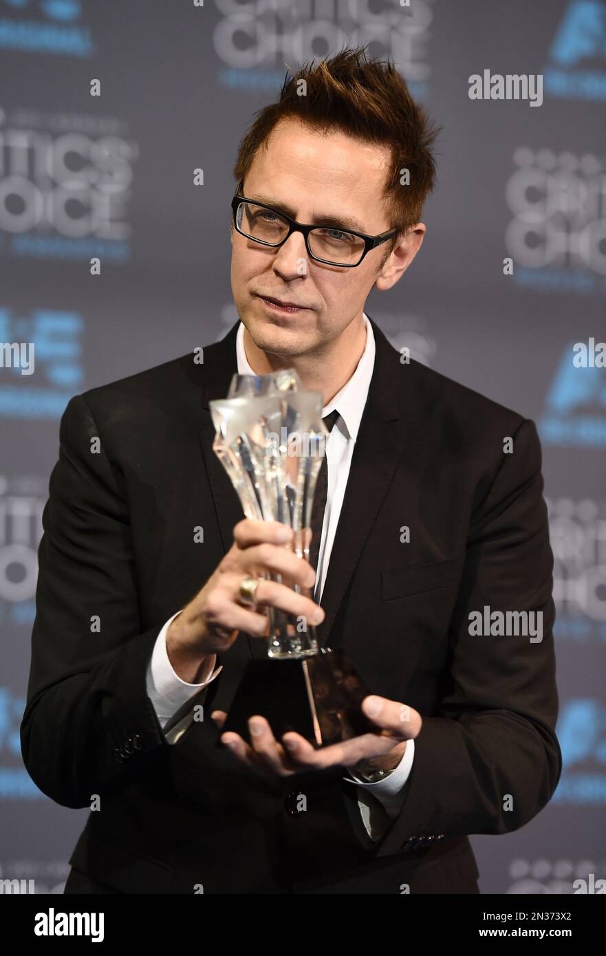 James Gunn poses in the press room with the best action movie award for ...