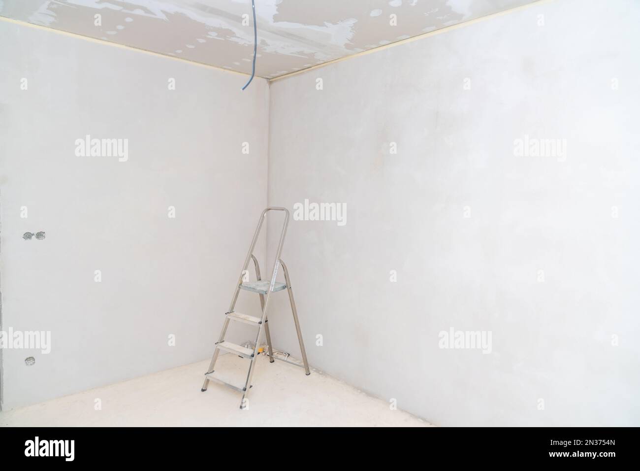 folding ladder on construction site Stock Photo - Alamy