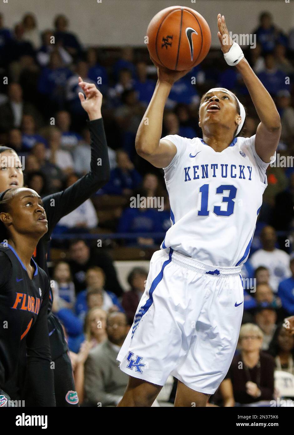 Kentucky's Bria Goss (13) shoots near Florida's Ronni Williams, bottom ...
