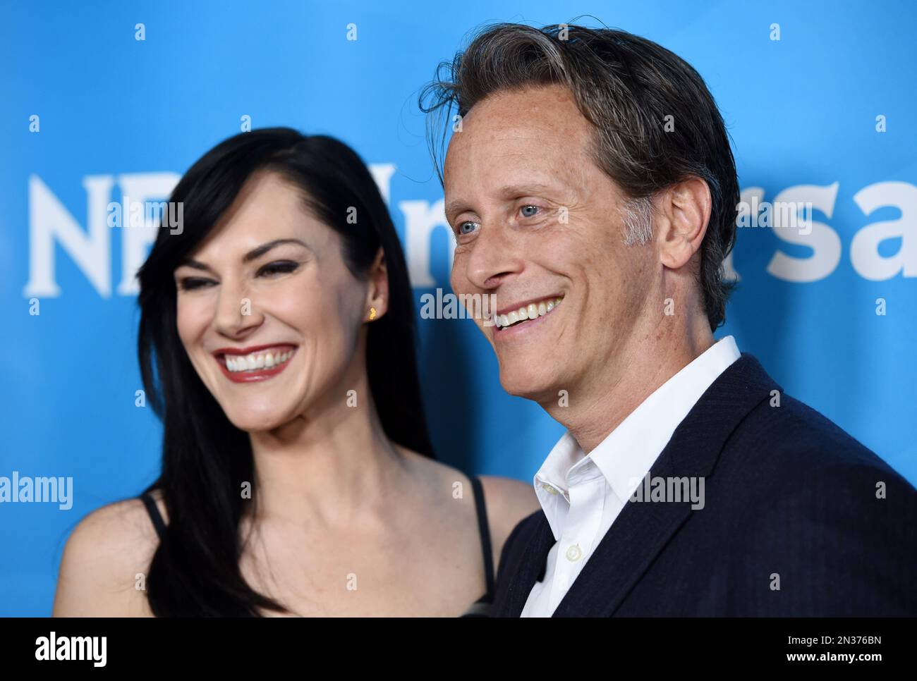 Kyra Zagorsky, left, and Steven Weber, cast members in the Syfy series ...