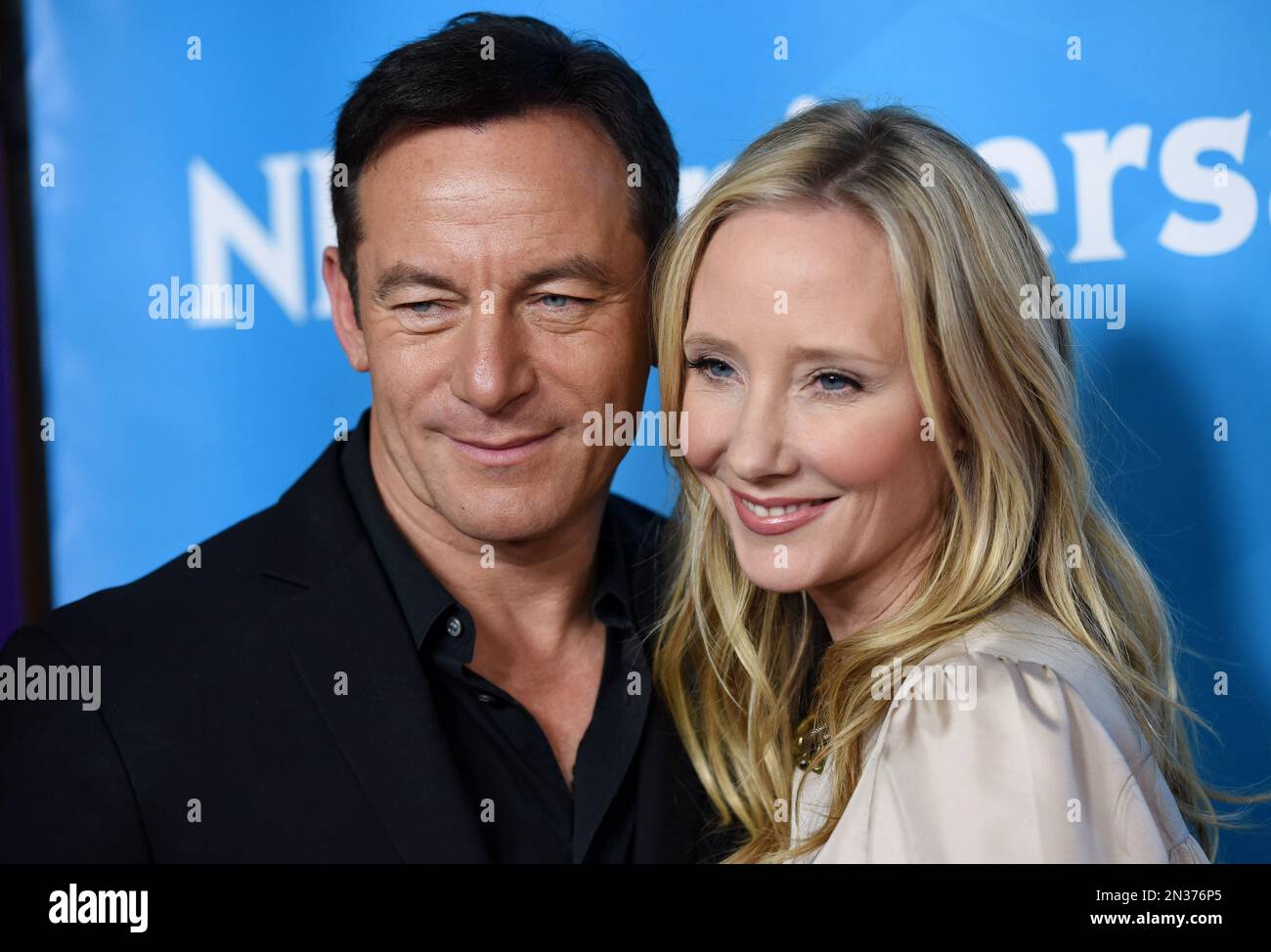 Jason Isaacs, left, and Anne Heche, cast members in the USA series "Dig ...