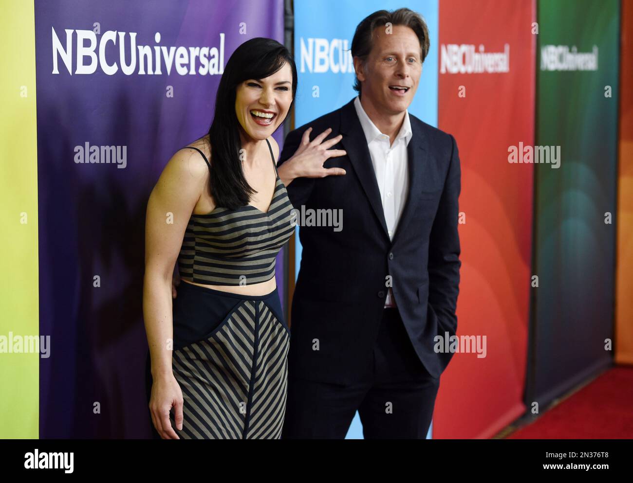 Kyra Zagorsky, left, and Steven Weber, cast members in the Syfy series ...
