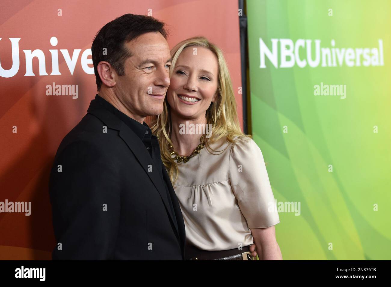 Jason Isaacs, left, and Anne Heche, cast members in the USA series "Dig ...