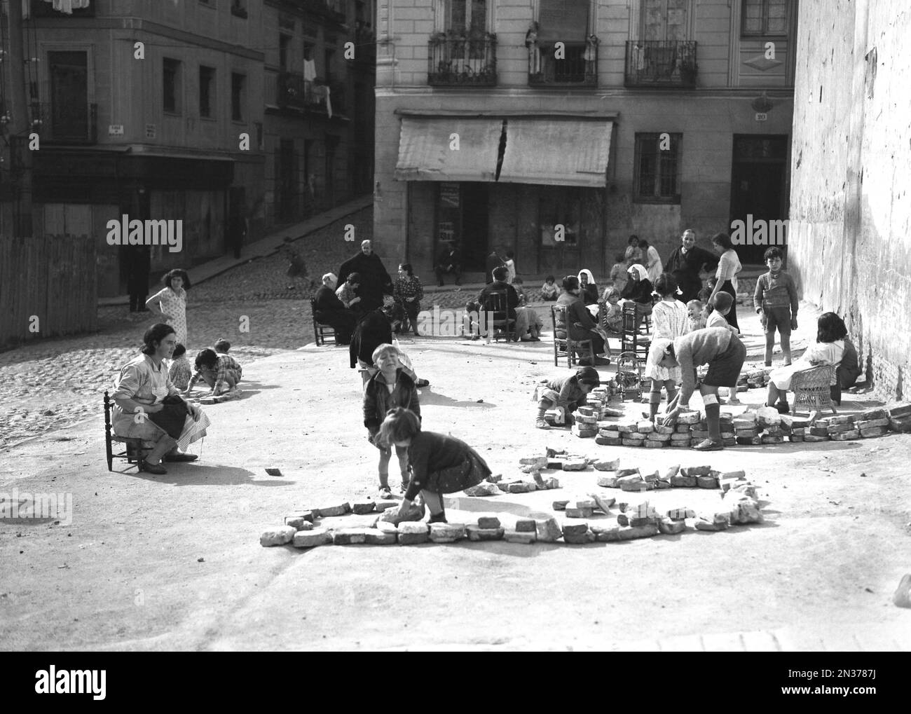 A typical study of Spanish life in the poorer districts of Madrid ...