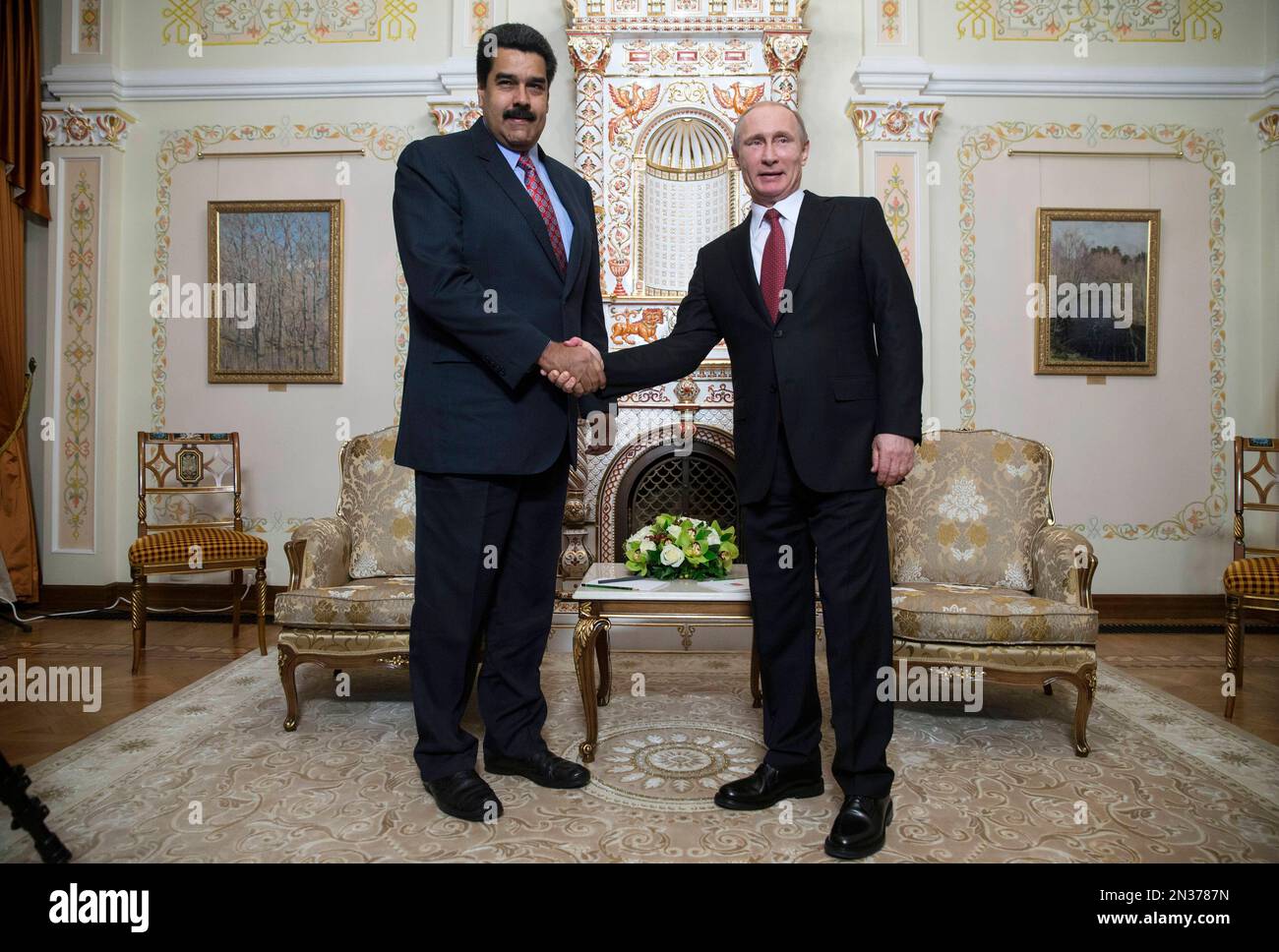 Russian President Vladimir Putin, right, and Venezuelan President ...