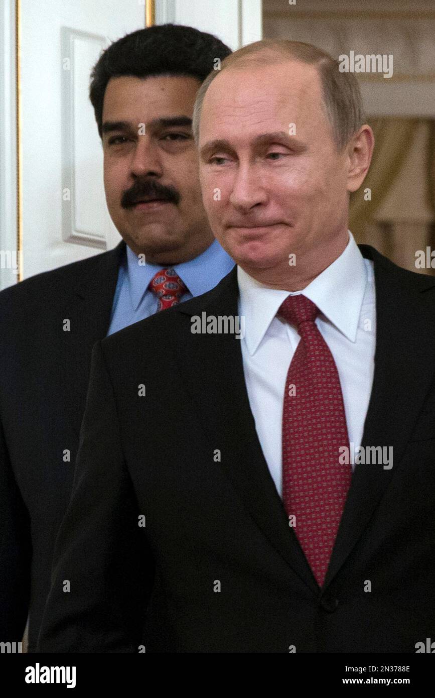 Russian President Vladimir Putin, front, and Venezuelan President ...