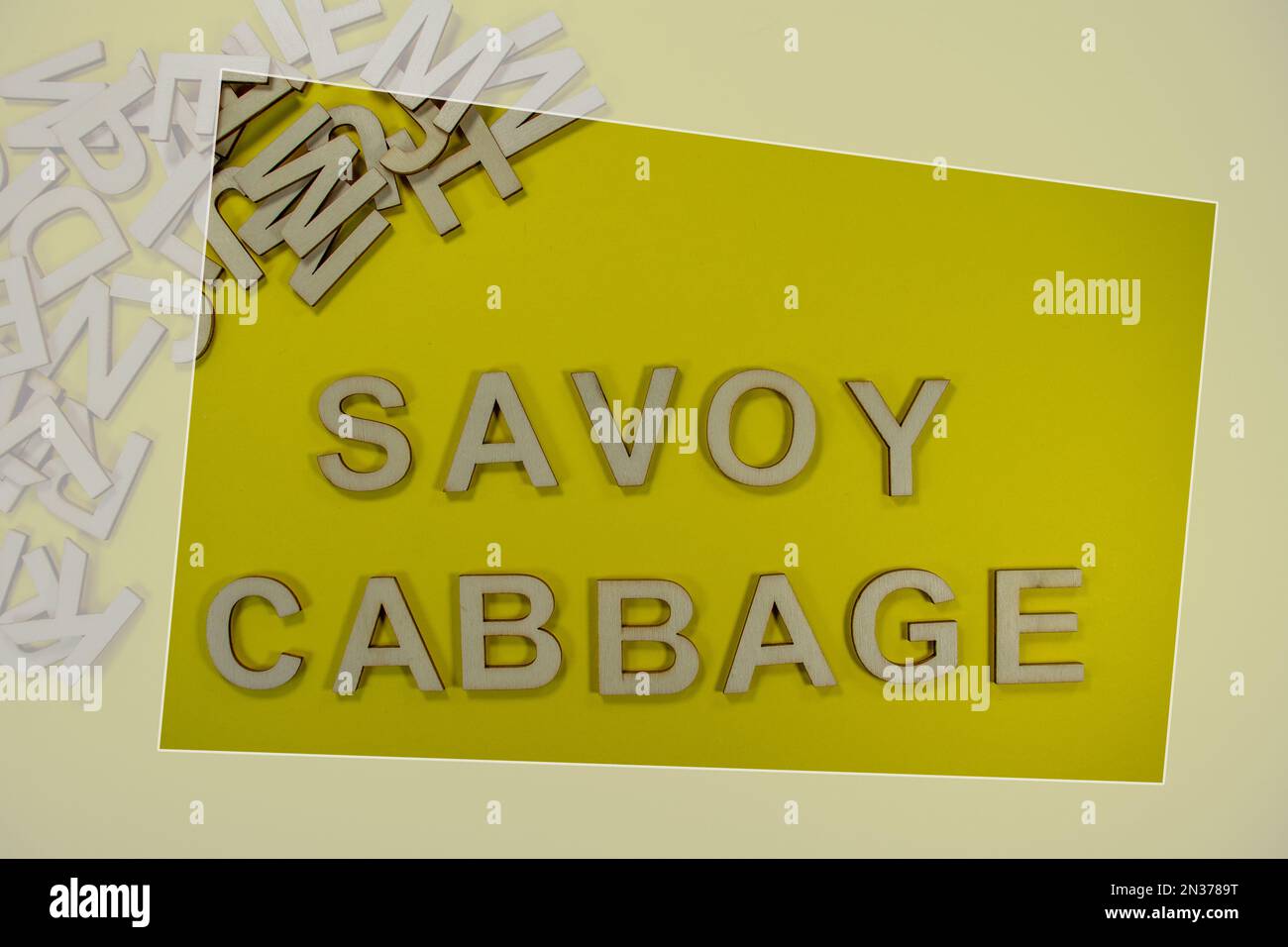 SAVOY CABBAGE in wooden English words language capital letters spilling ...