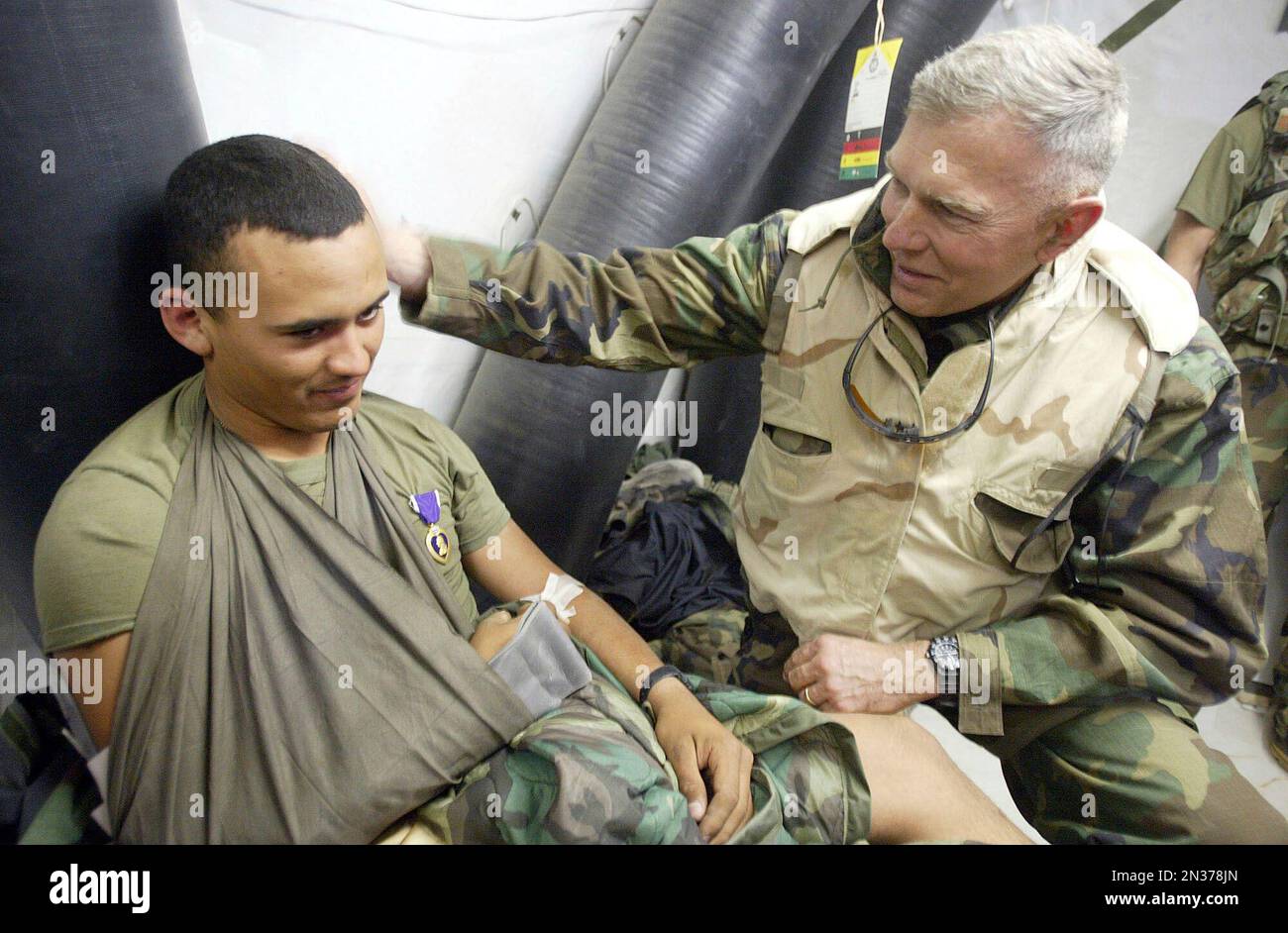Marine receives the Purple Heart Medal. Marine Lance Corporal Roland ...