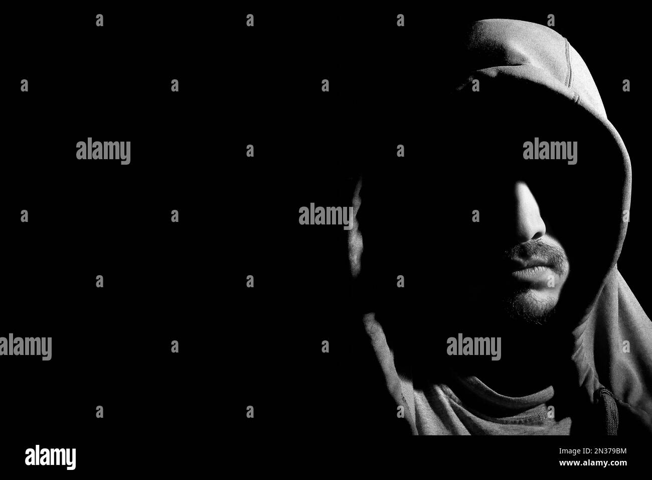 Hidden face hoodie Black and White Stock Photos & Images - Alamy