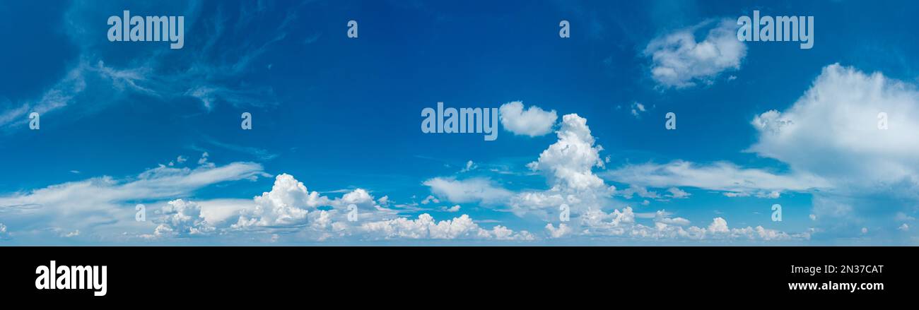 Deep blue sky and different types of white clouds in it. Beautiful ...