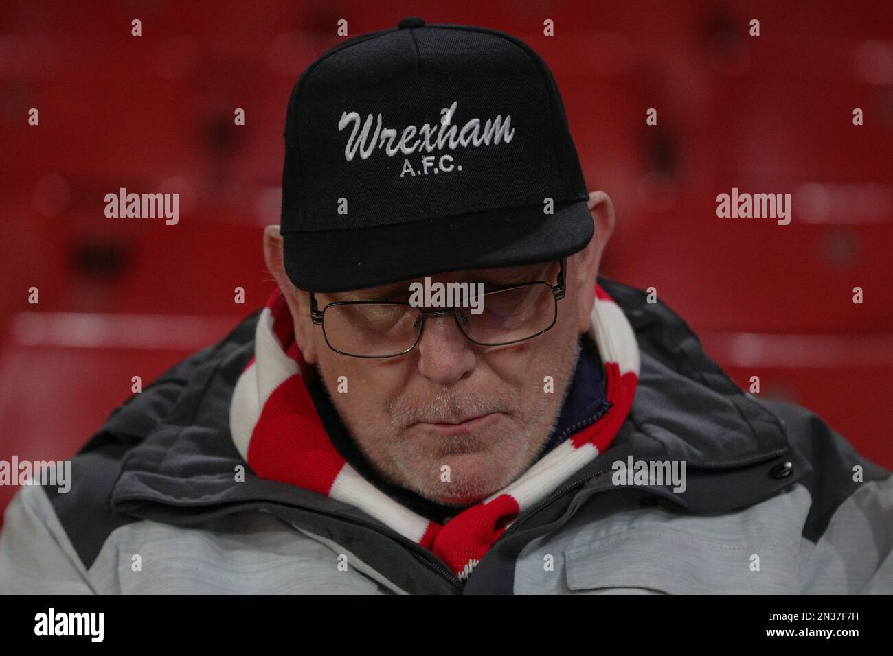 A Wrexham fan wears a club branded hat the Emirates FA Cup Fourth Round ...