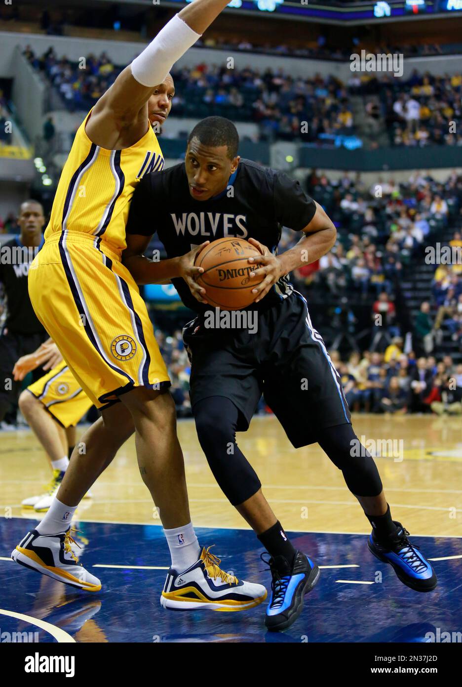 Minnesota Timberwolves forward Thaddeus Young, right, pushes his way to ...
