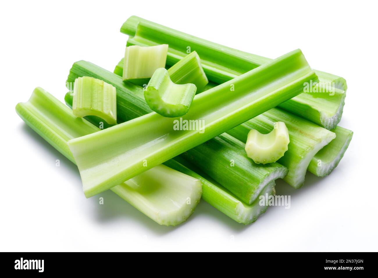 Pile of celery ribs isolated on white background Stock Photo - Alamy