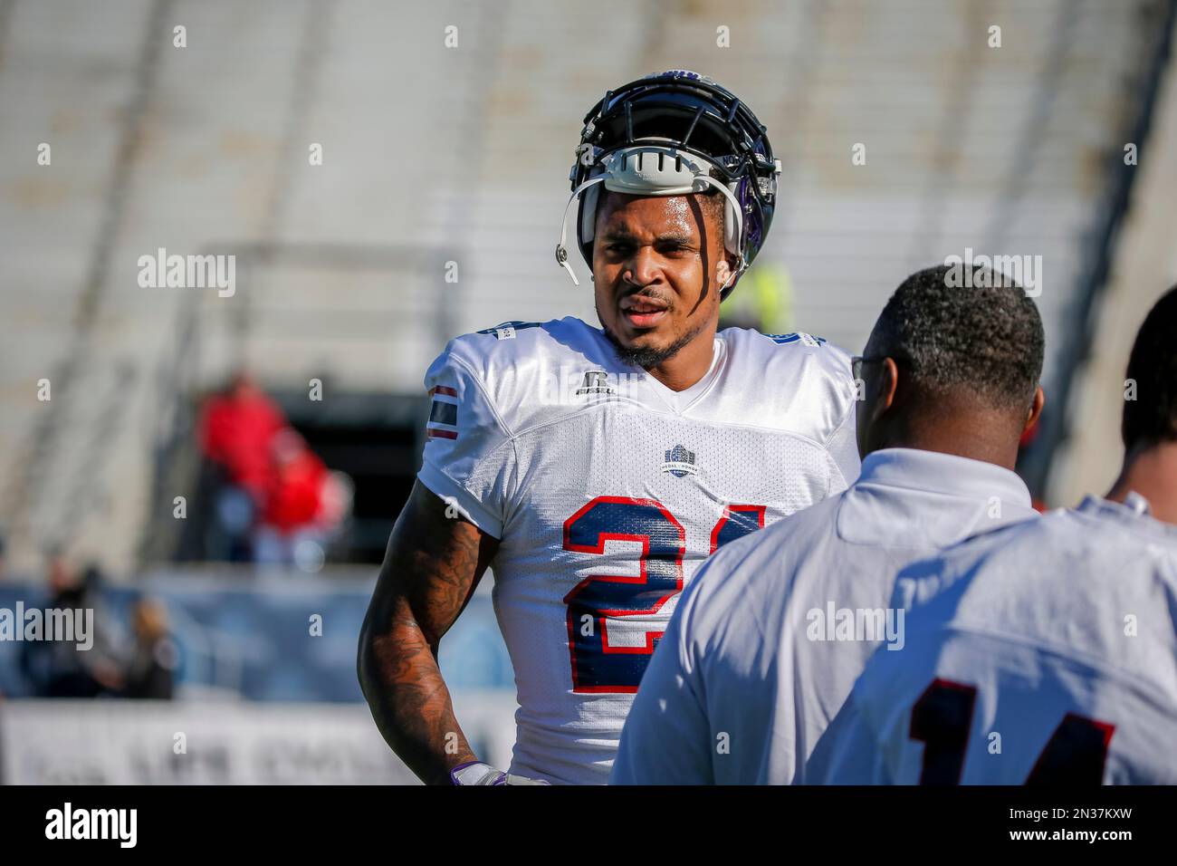 American team wide receiver Kyle Prater talks to his coach during warms ...