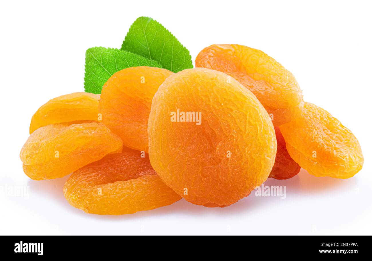 Delicious dried apricots and green apricot leaves. File contains ...