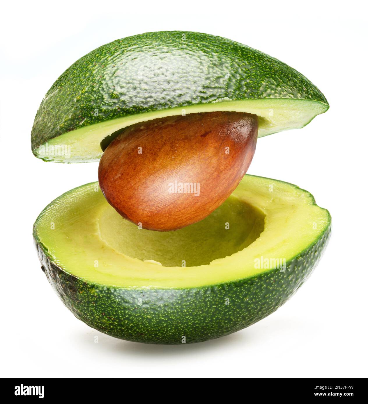 Cut avocado fruit isolated on white background Stock Photo - Alamy