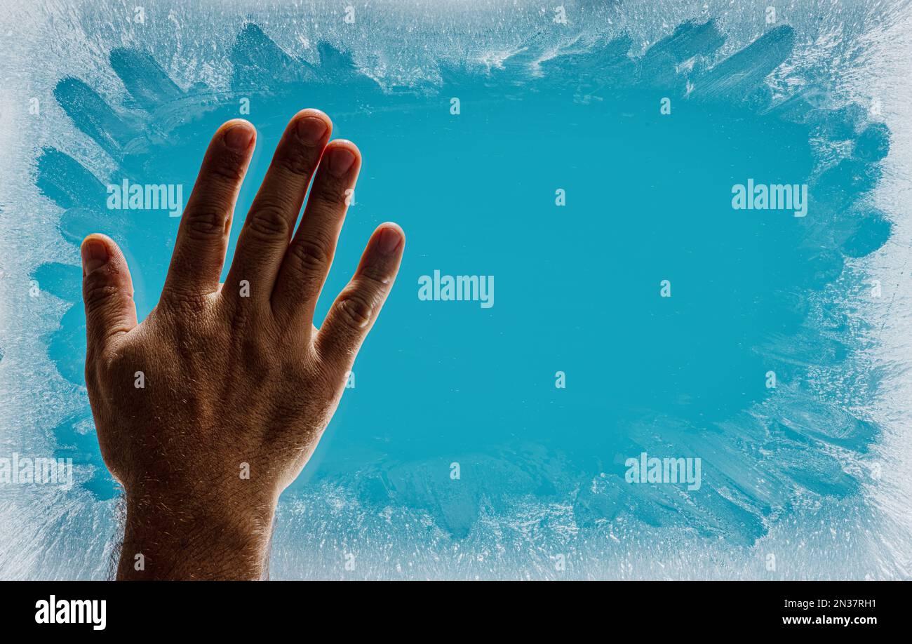 Frost patterns on frozen winter window as a symbol of Christmas wonder ...