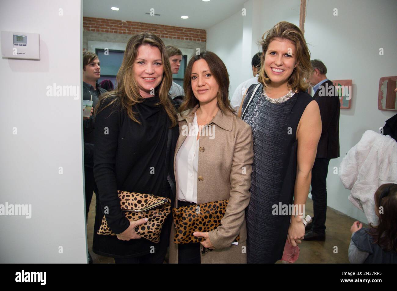 Jennifer Hawks, left, guest, and Marika Kielland attend the LAXART ...