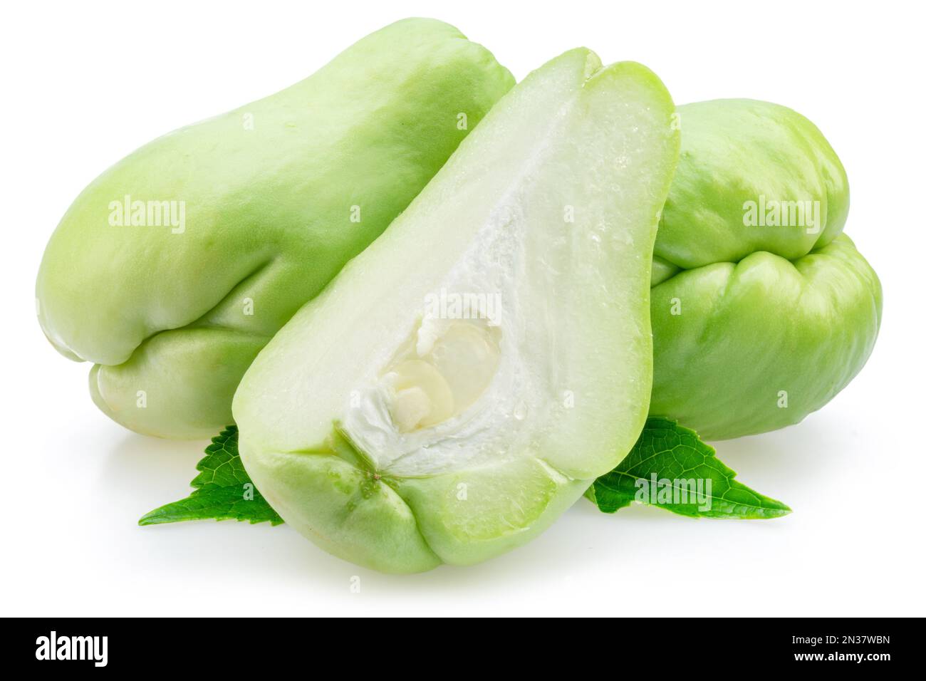 Chayote fruit and half of chayote fruit isolated on white background Stock Photo - Alamy
