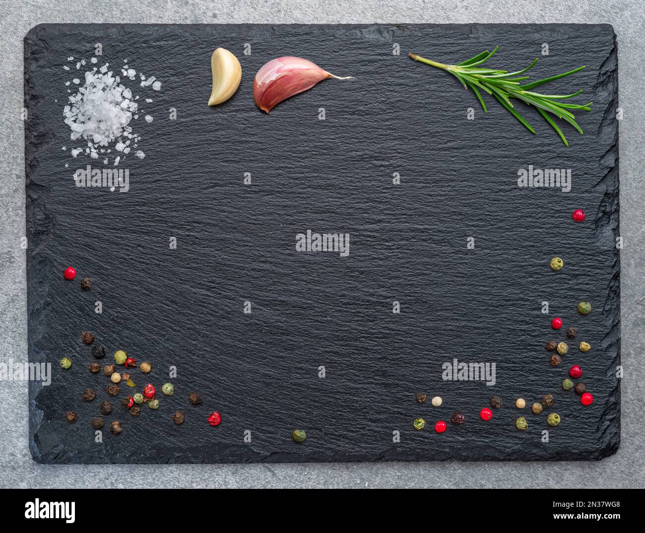 Natural stone black slate serving plate with seasonings and spices ...