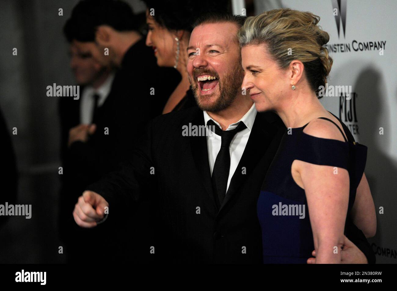 Ricky Gervais, left, and Jane Fallon arrive at The Weinstein Company ...