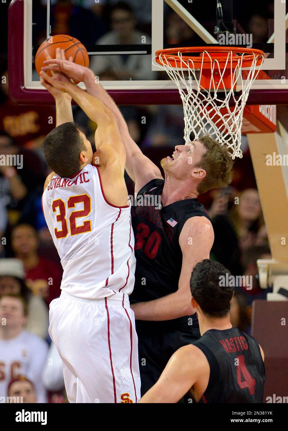 Southern California forward Nikola Jovanovic (32) drives on Stanford ...