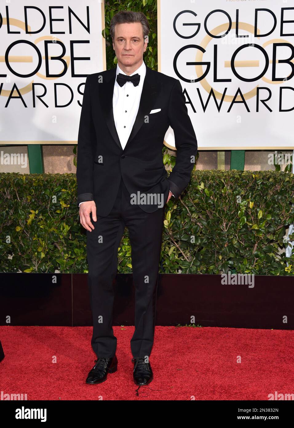 Colin Firth arrives at the 72nd annual Golden Globe Awards at the ...