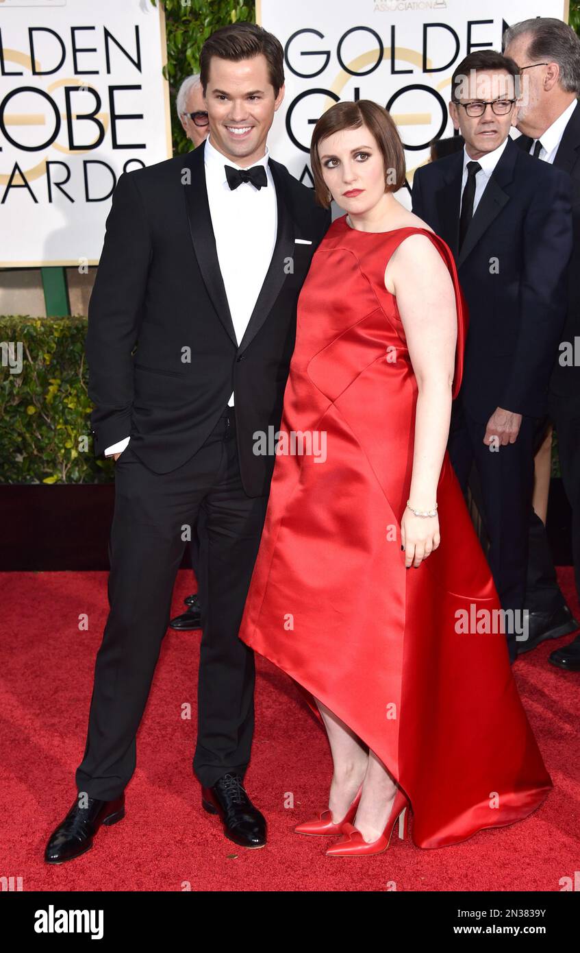 Andrew Rannells, left, and Lena Dunham arrive at the 72nd annual Golden ...