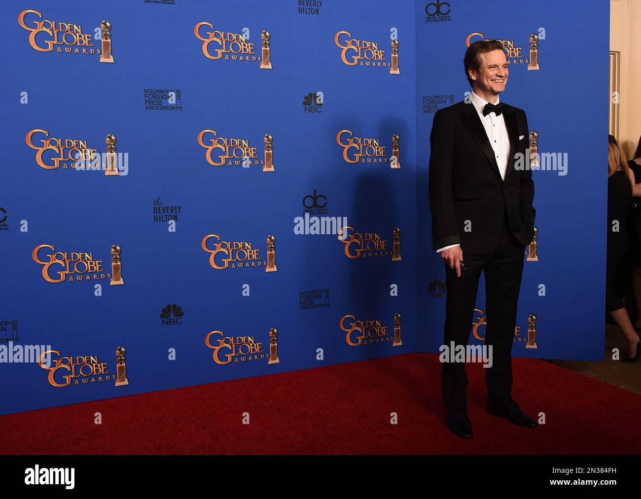 Colin Firth poses in the press room at the 72nd annual Golden Globe ...