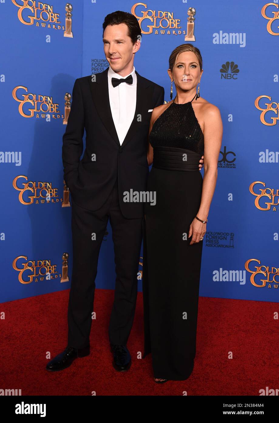 Benedict Cumberbatch, left, and Jennifer Aniston pose in the press room ...
