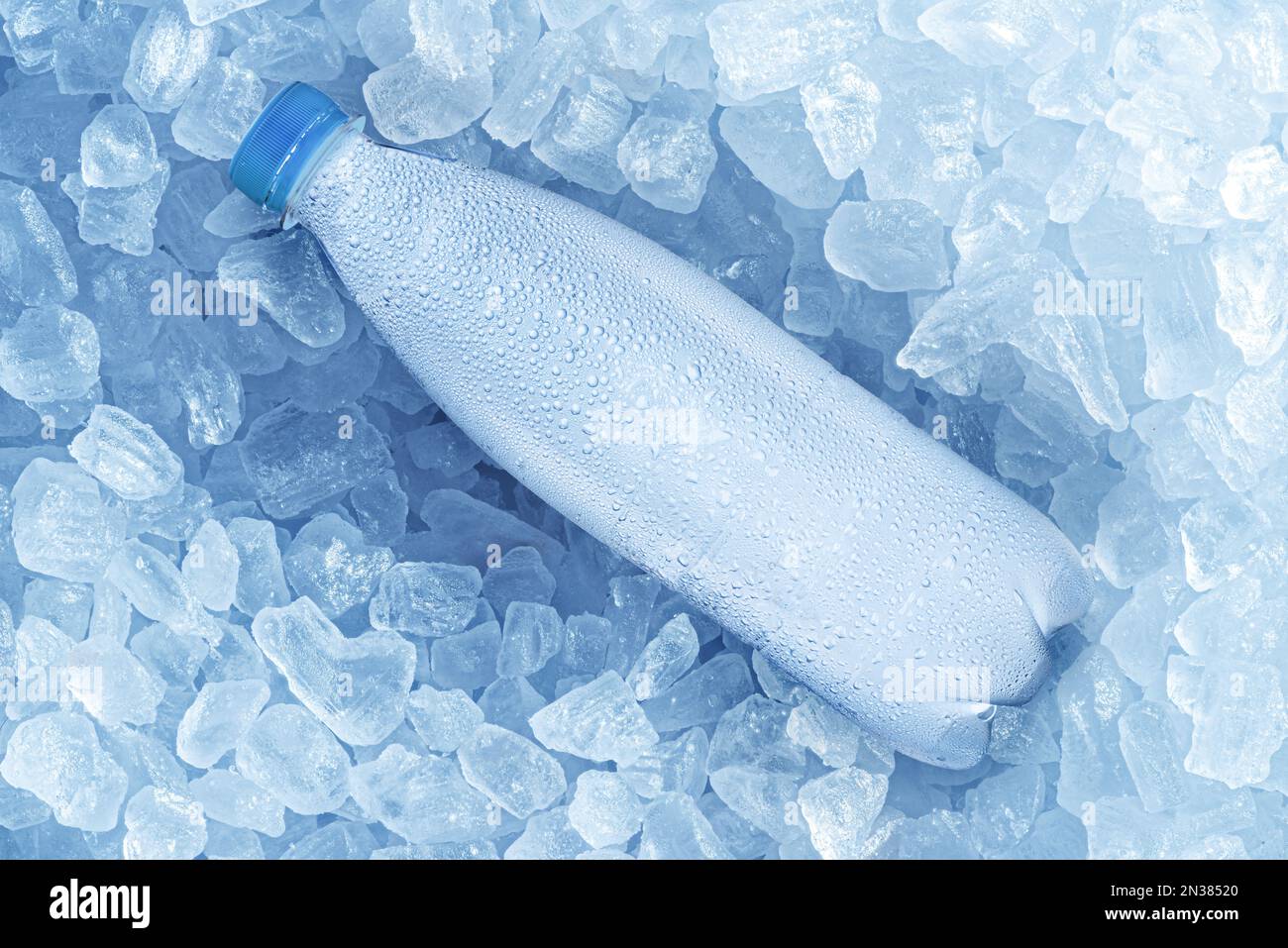 Cold bottle of water over ice cubes. Food and drink background Stock Photo - Alamy