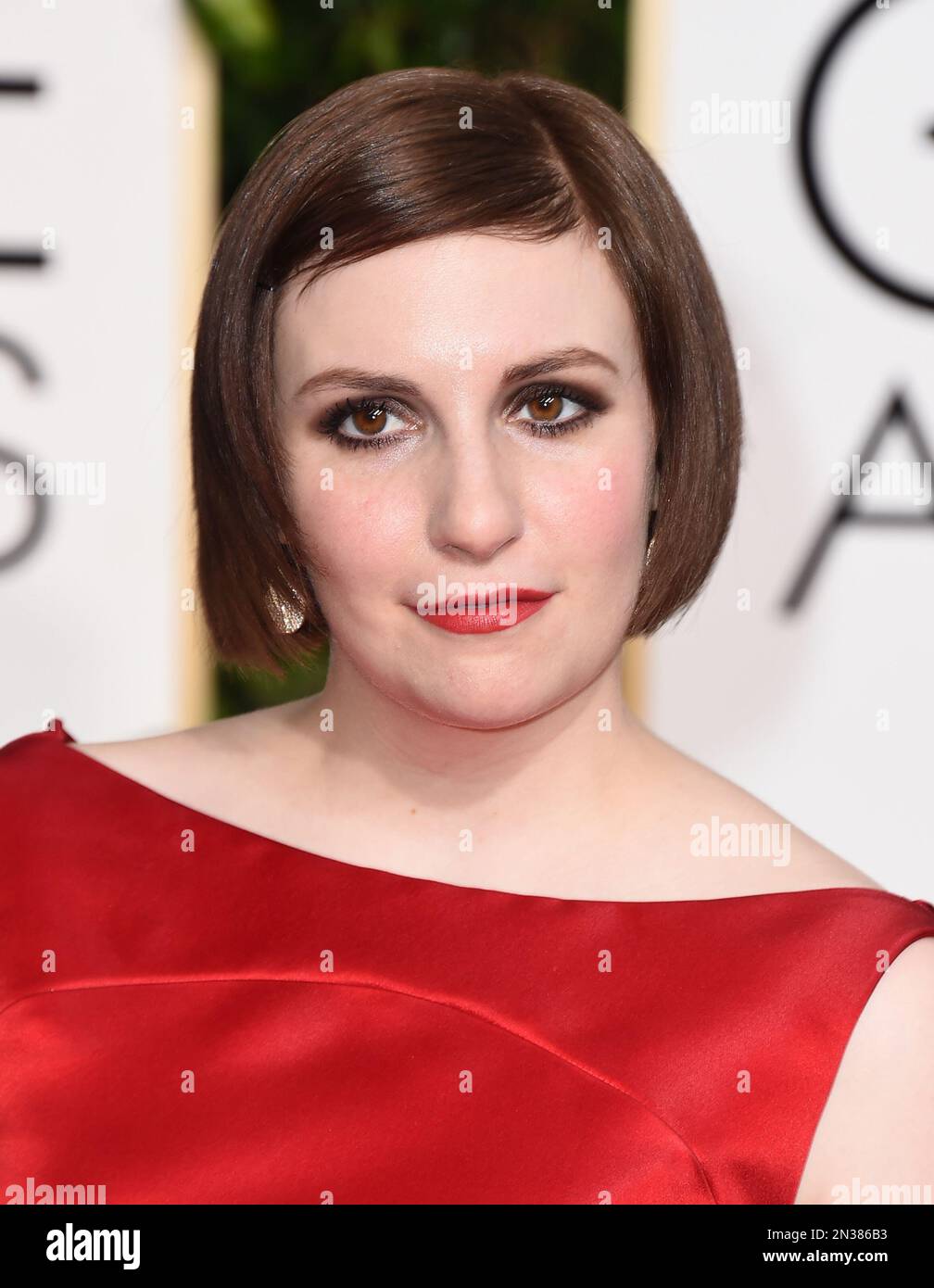 Lena Dunham arrives at the 72nd annual Golden Globe Awards at the ...