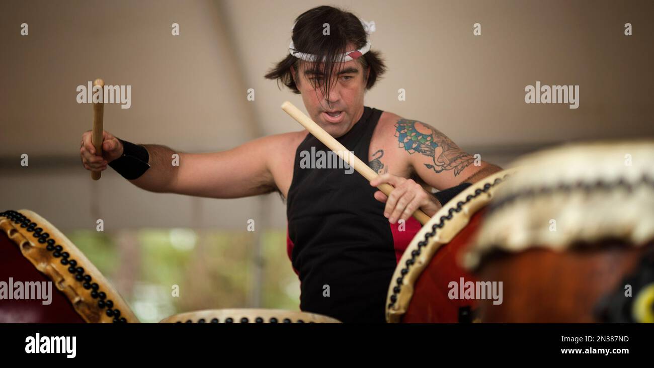Ben Miller, the artistic director of Fushu Daiko drums, performs during ...