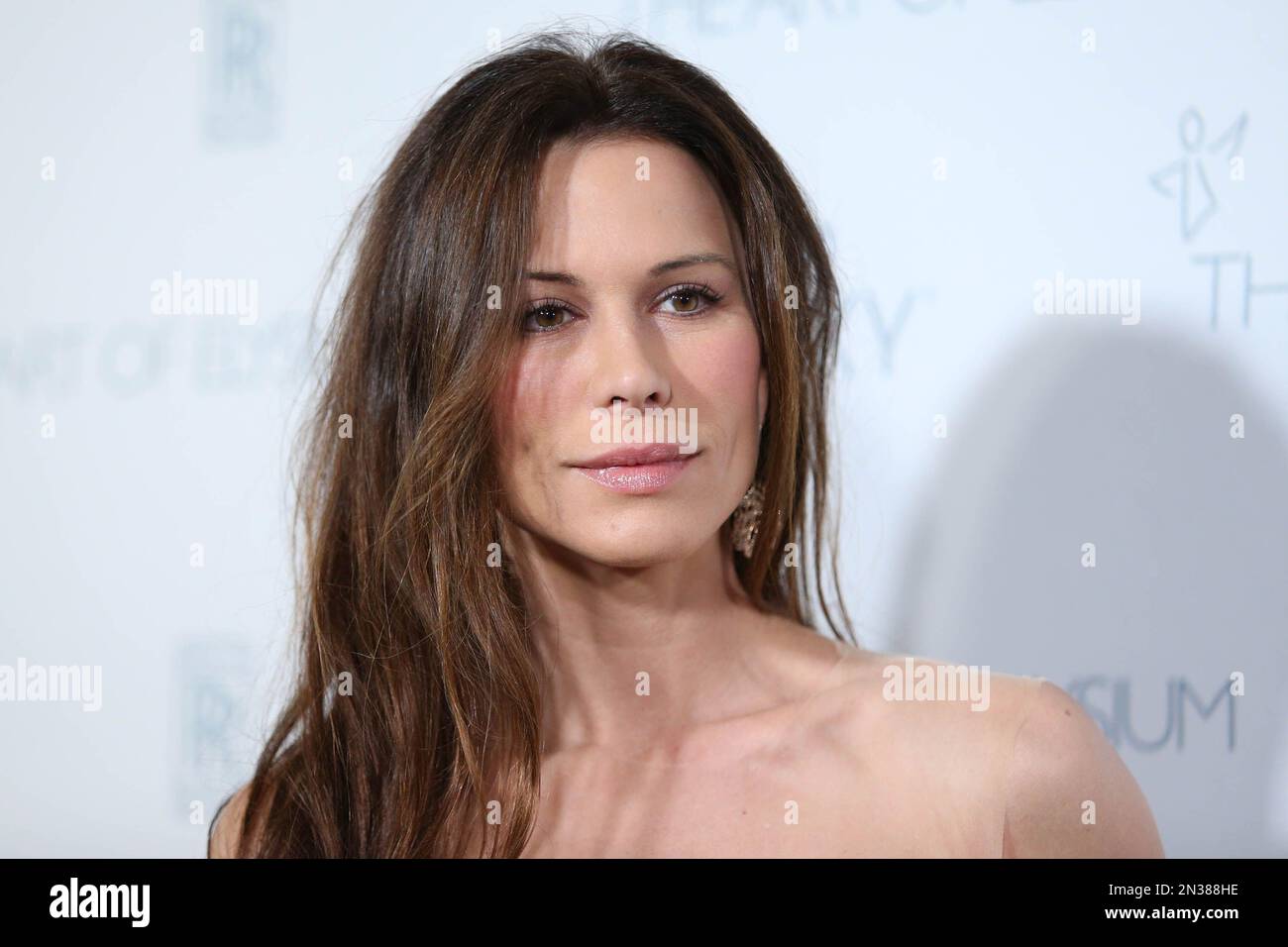 Rhona Mitra arrives at The Art Of Elysium Heaven Gala at Hangar 8 on ...