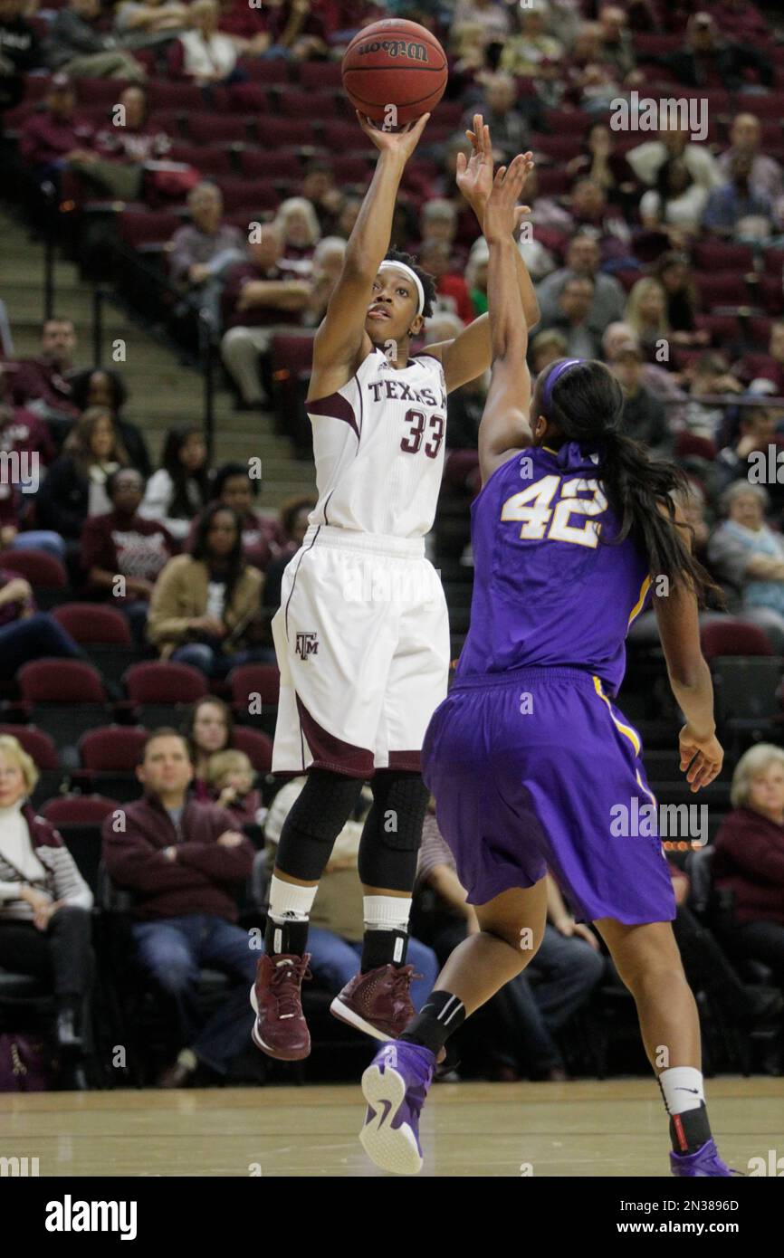 Texas A&M's Courtney Walker (33) shoots over LSU's Sheila Boykin (42 ...