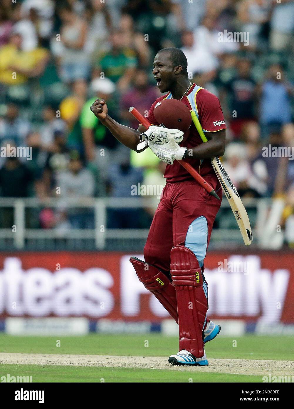 West Indies’ captain Darren Sammy reacts after scoring winning runs ...