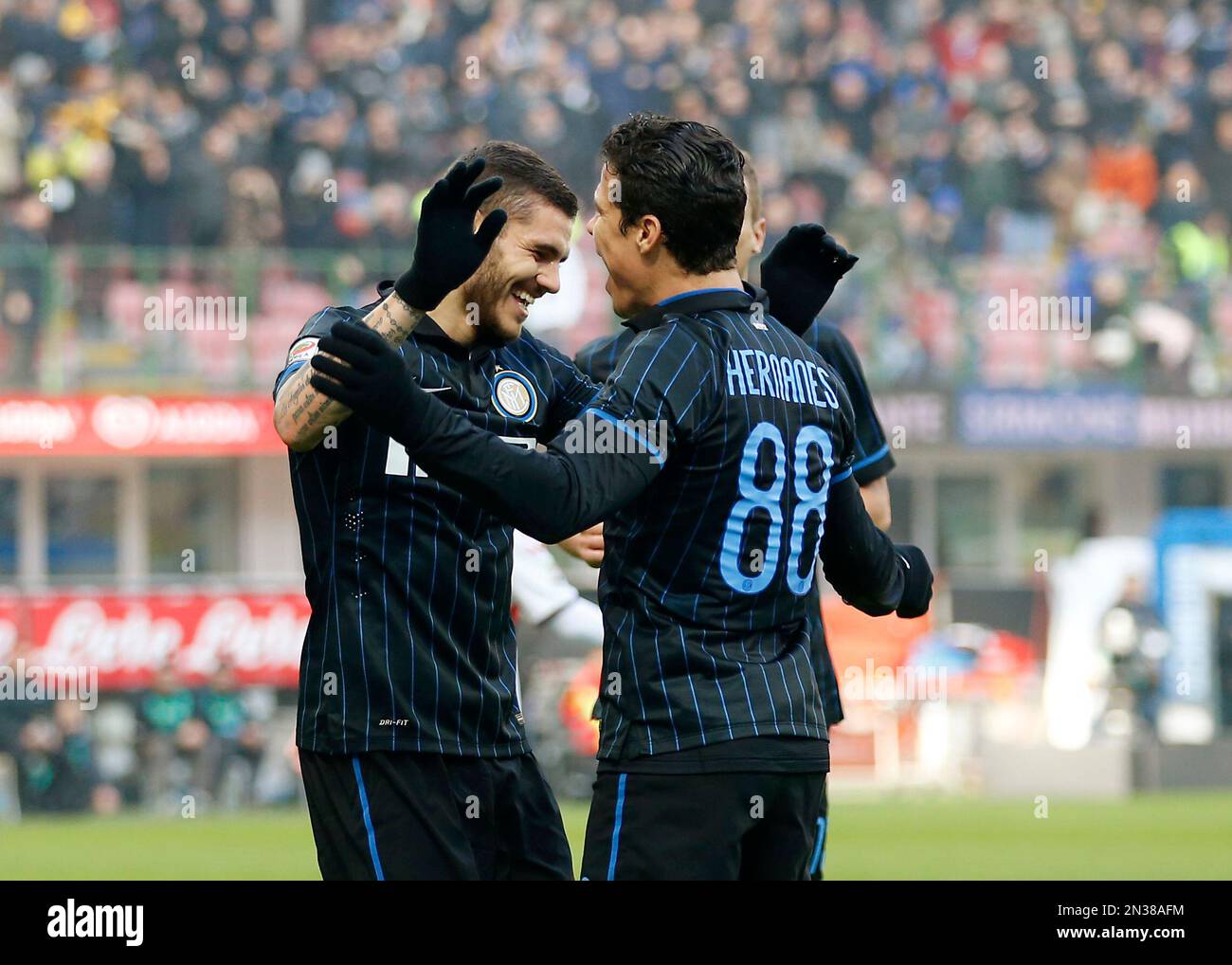 Inter Milan's Mauro Icardi, left, celebrates with his teammate Anderson ...