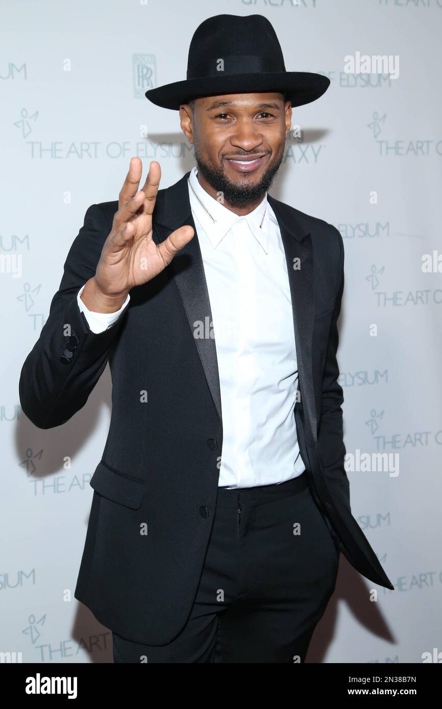 Usher arrives at The Art Of Elysium Heaven Gala at Hangar 8 on Saturday ...