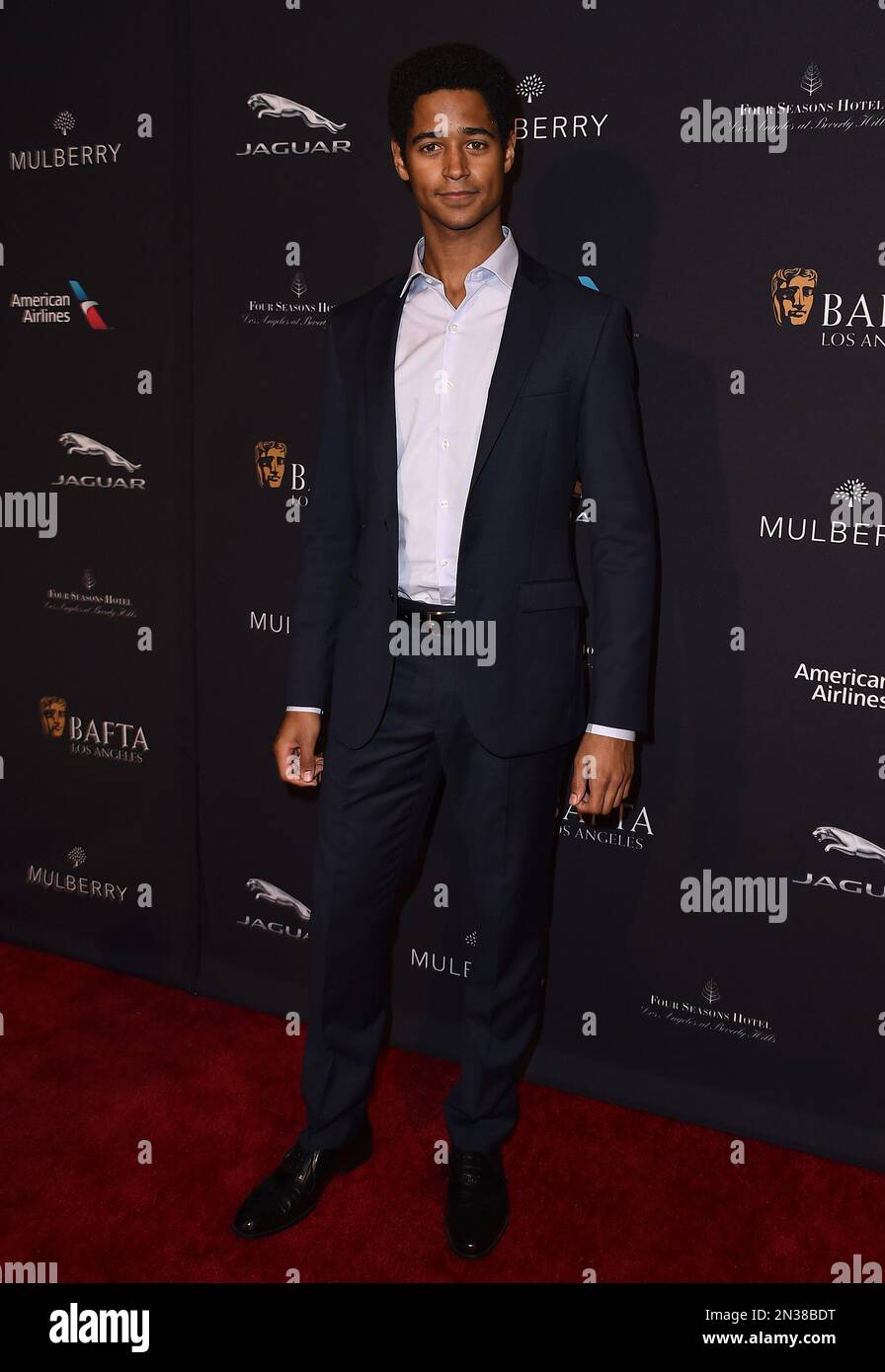 Alfred Enoch arrives at the BAFTA 2015 awards season tea party at The ...
