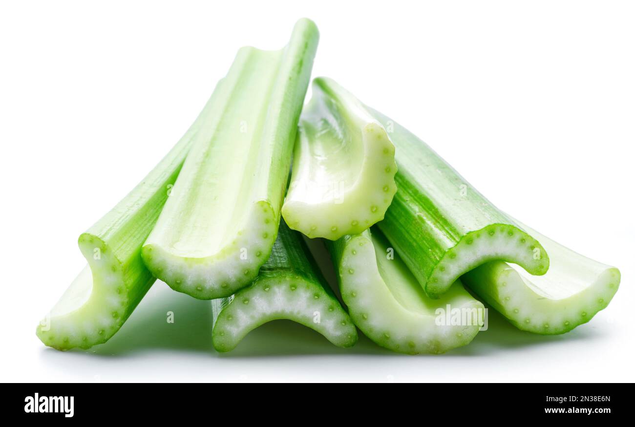 Pile of celery ribs isolated on white background Stock Photo - Alamy