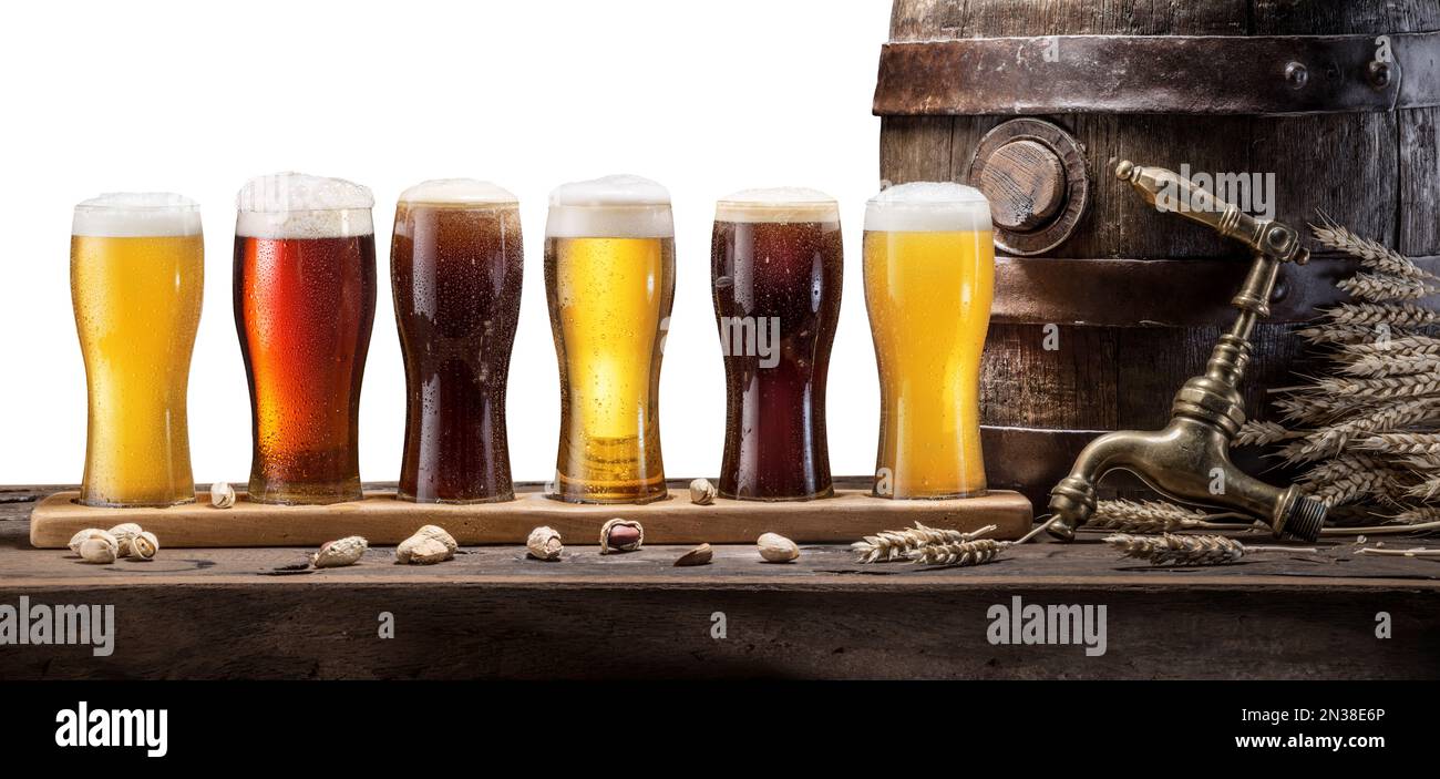 Collection of different chilled beer, beer cask isolated on white ...