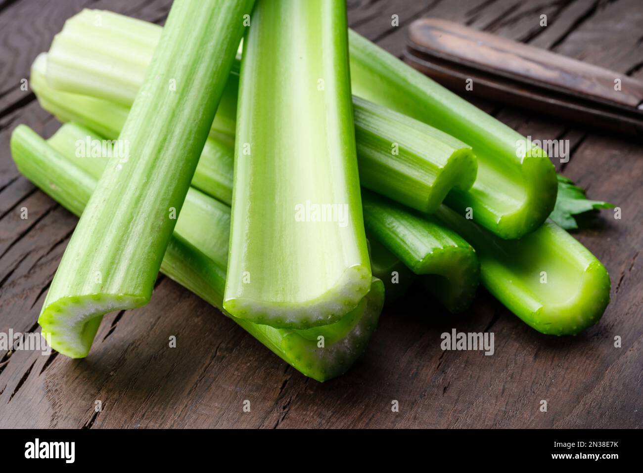 Pile of celery ribs isolated on white background Stock Photo - Alamy