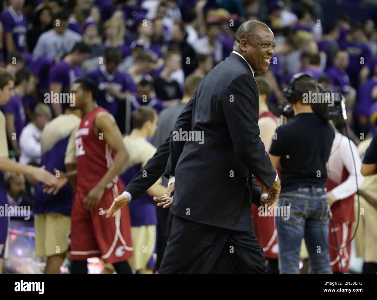 Washington State head coach Ernie Kent smiles after an NCAA college ...