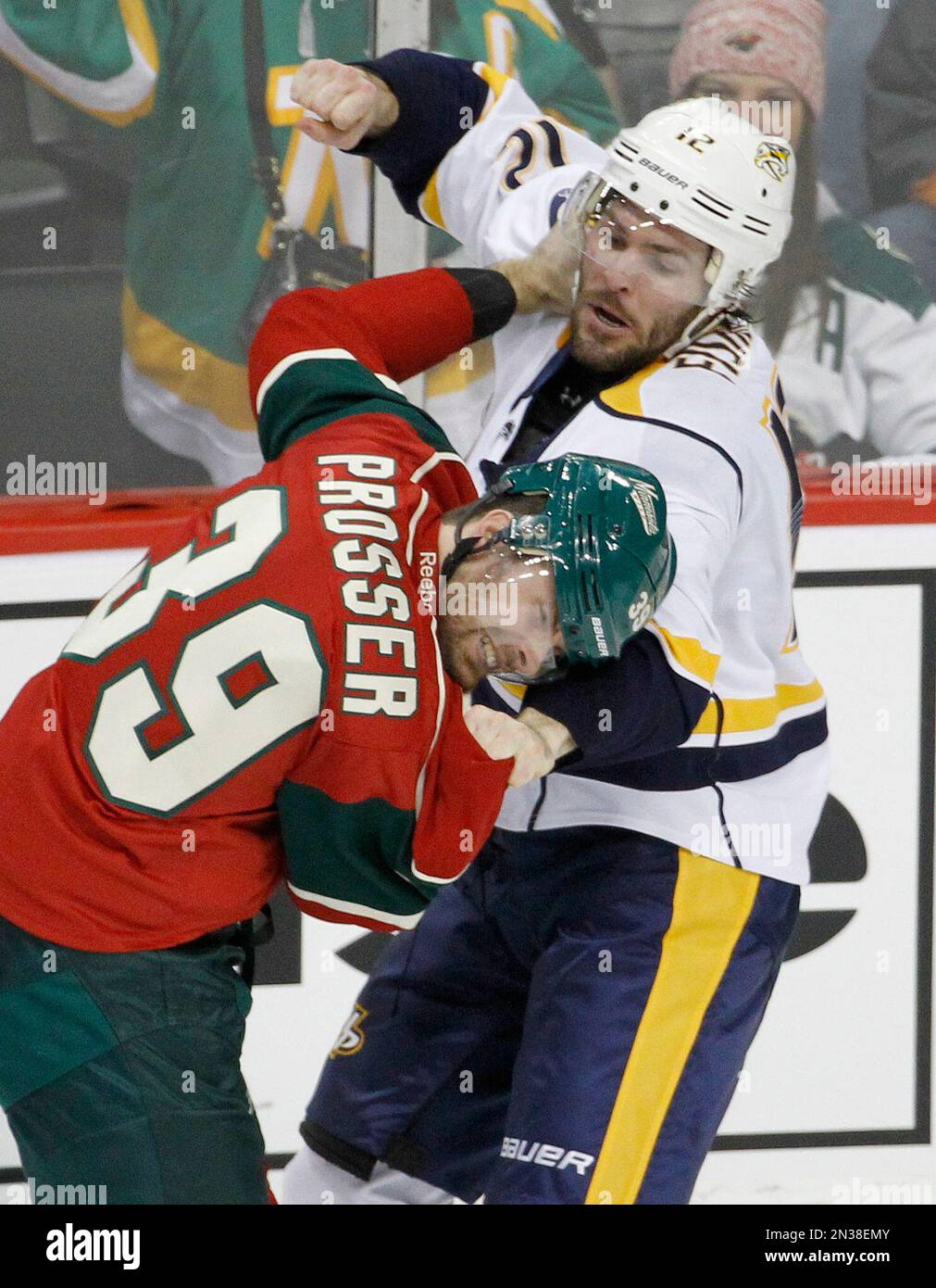 Nashville Predators center Mike Fisher (12) and Minnesota Wild ...