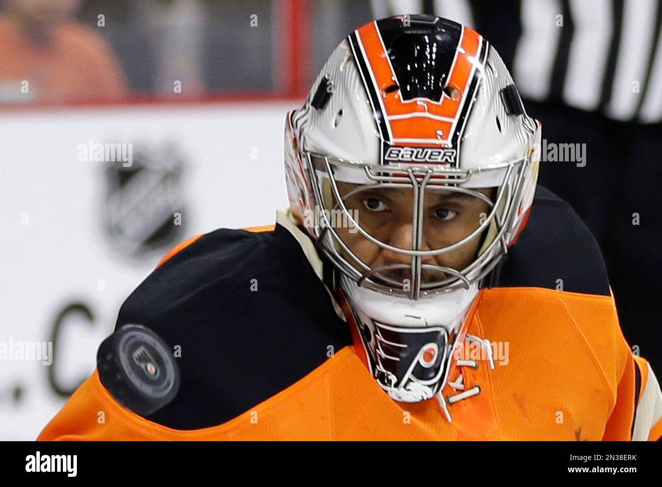 Philadelphia Flyers' Ray Emery watches a deflected shot fly by during ...