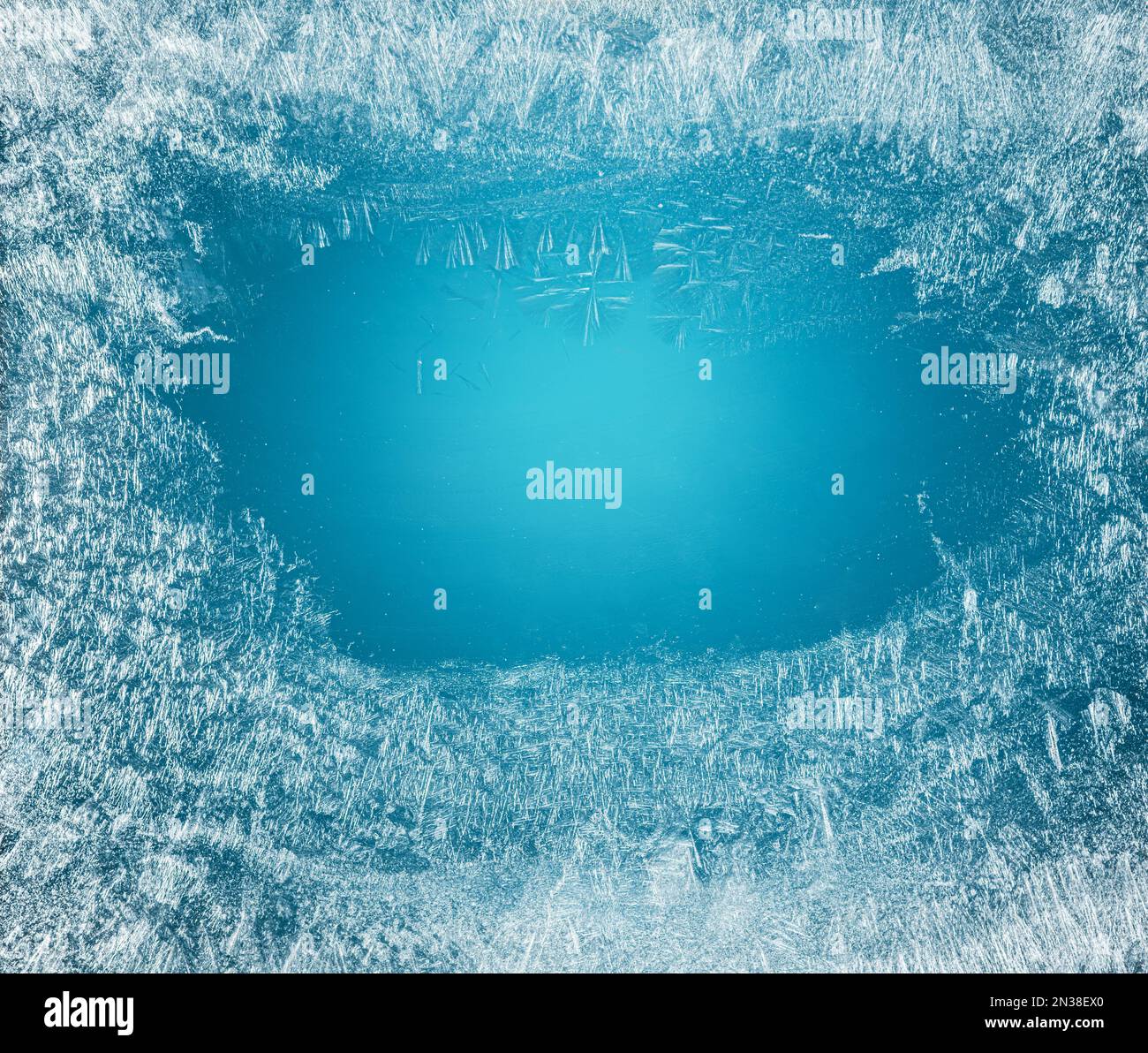 Frost patterns on frozen winter window as a symbol of Christmas wonder ...
