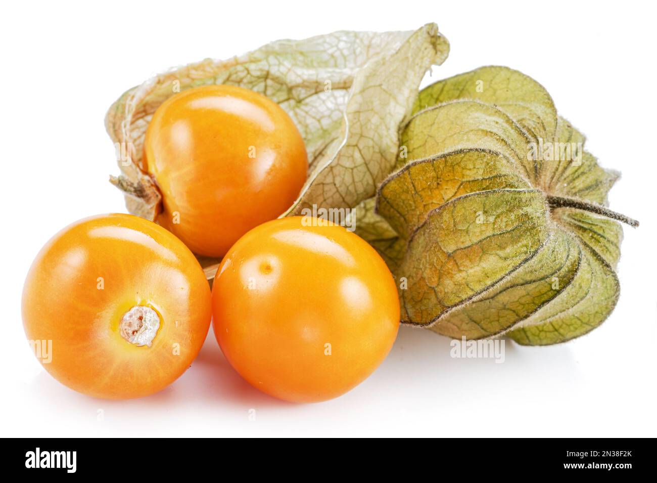 Ripe physalis or golden berry fruits in calyx isolated on white ...