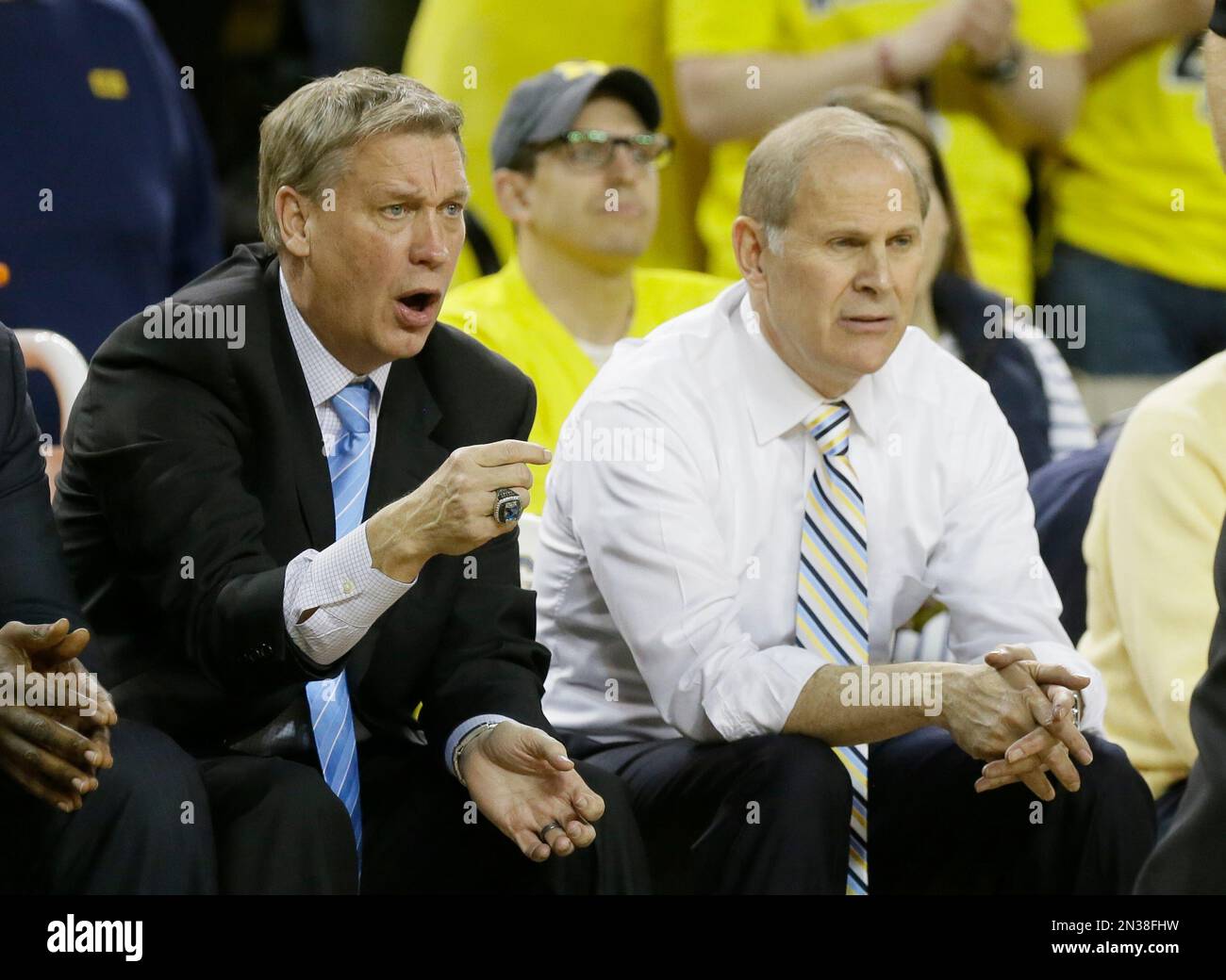 Michigan assistant coach Jeff Meyer, left, and head coach John Beilein ...
