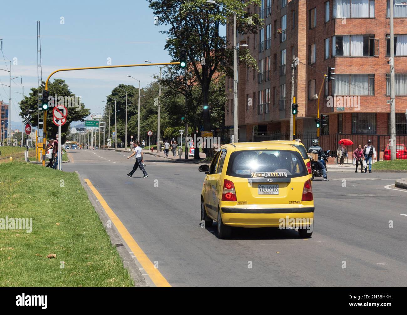 BOGOTA, COLOMBIA - A reckless pedestrian woman crossing the avenue in ...