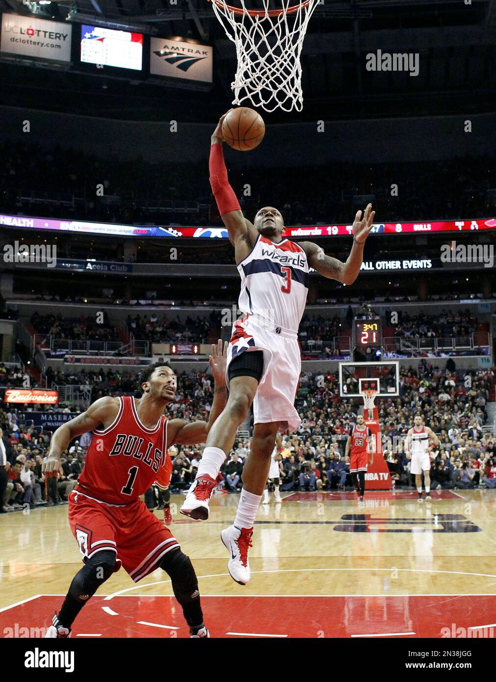 Washington Wizards guard Bradley Beal (3) dunks the ball in front of ...
